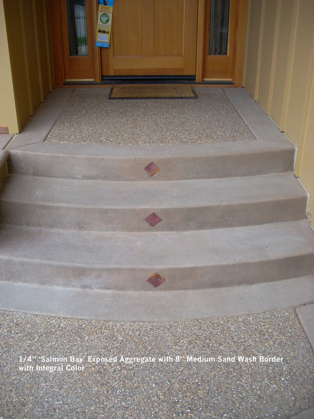 4” ‘Salmon Bay’ Exposed Aggregate with 8” Medium Sand Wash Border with ...